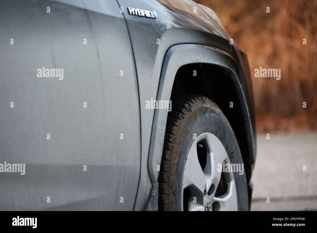 A dirty Toyota Rav4 Hybrid after being driven on dirty dirt roads Stock ...