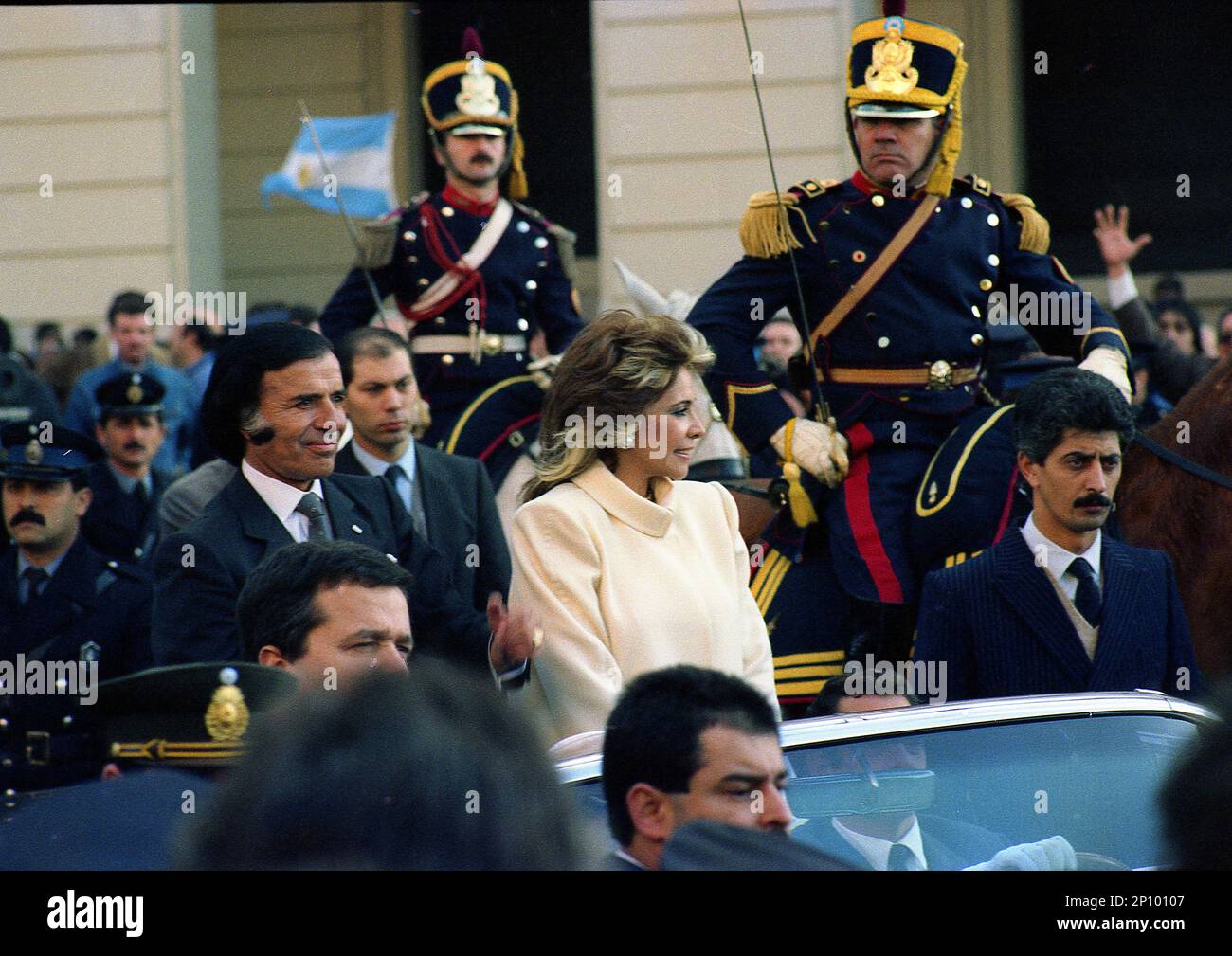 Carlos Saúl Menem and First Lady Zulema Yoma in a motorcade approaching ...