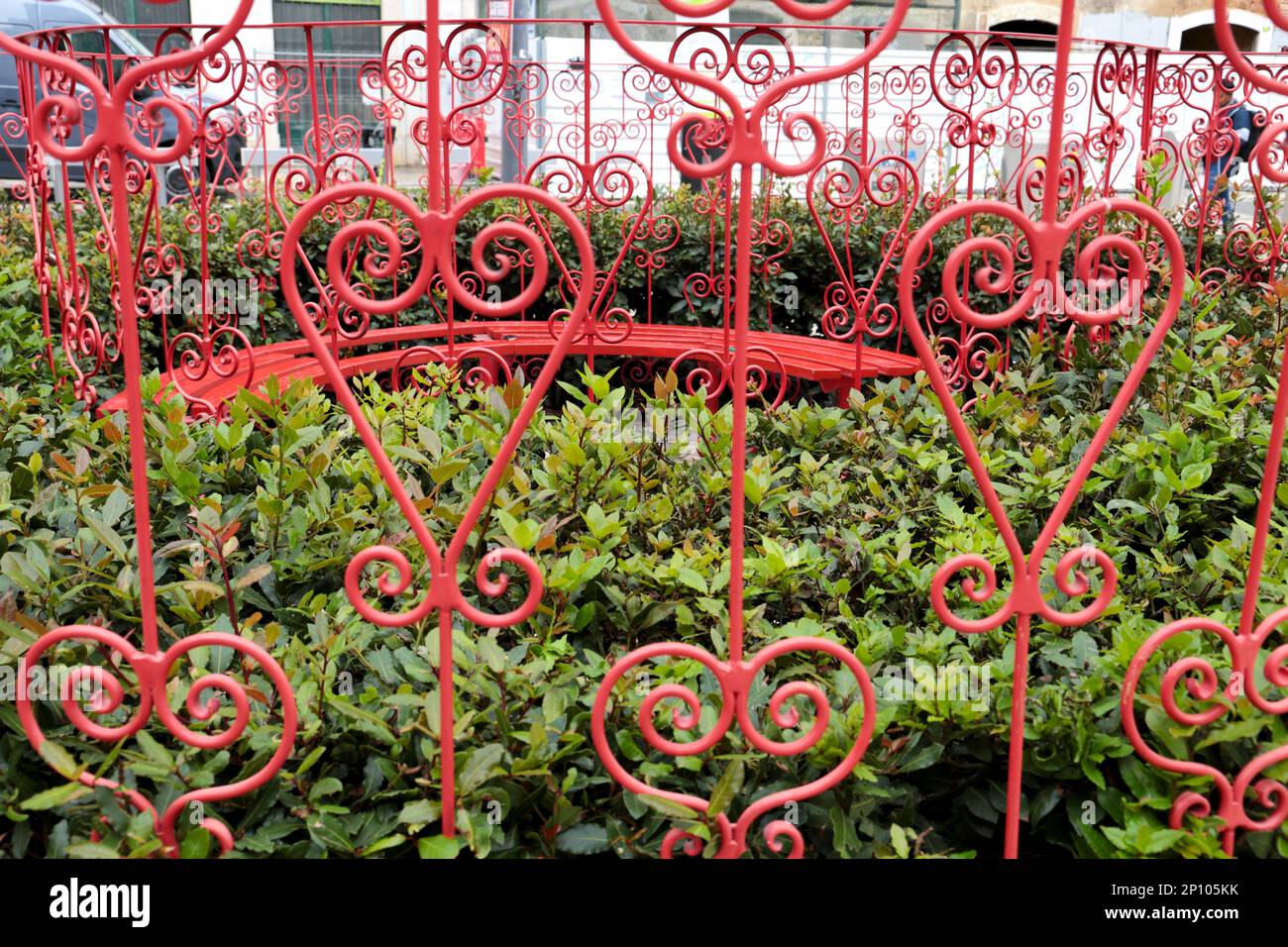 Metal forged fence painted red in a garden in Lisbon Square Stock Photo ...