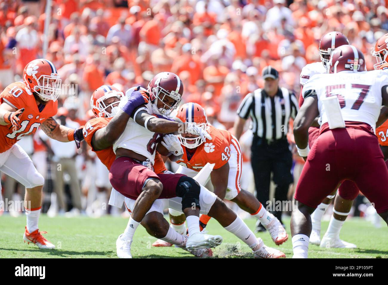 September 10, 2016: Troy’s Emanuel Thompson (8) is brought down by ...