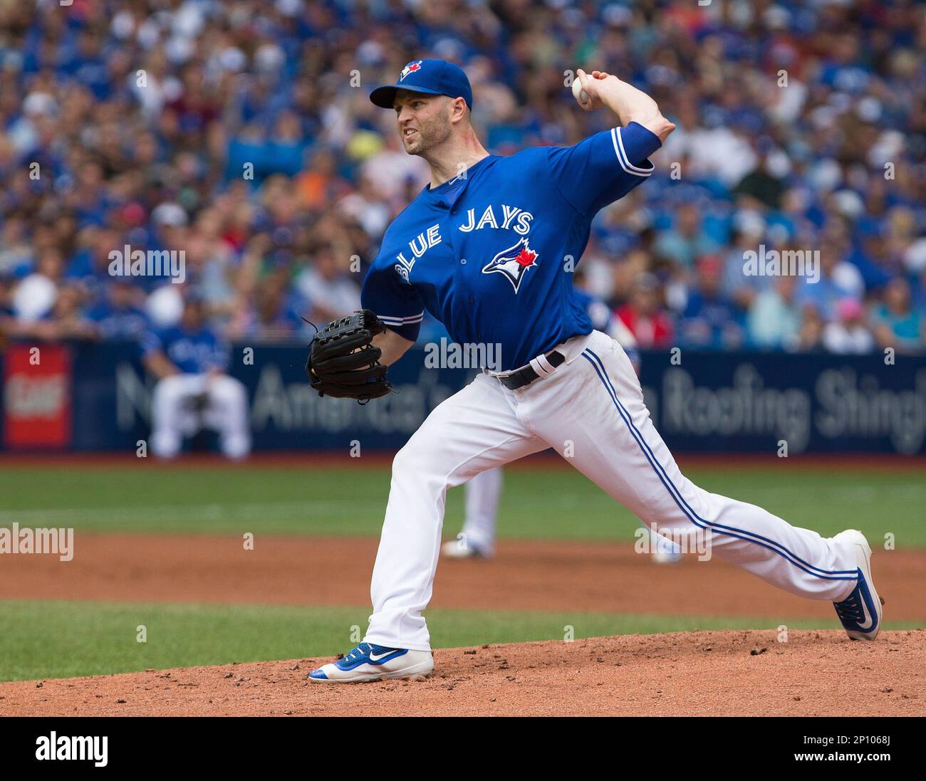 Toronto Blue Jays starting pitcher J.A. Happ (33) delivers a pitch ...