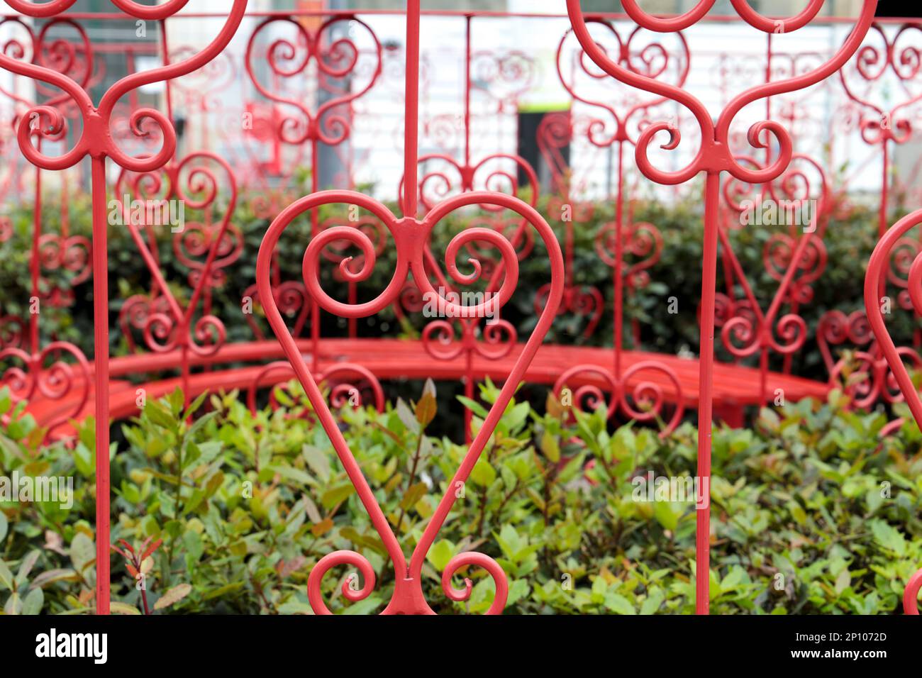 Metal forged fence painted red in a garden in Lisbon Square Stock Photo ...