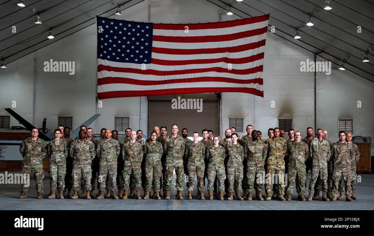 U.S. service members pose for a group photo at Al Dhafra Air Base ...