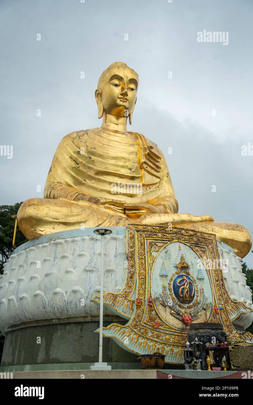 a golden Buddha figure at the Khao Thong Chai Mountain in the Town of ...