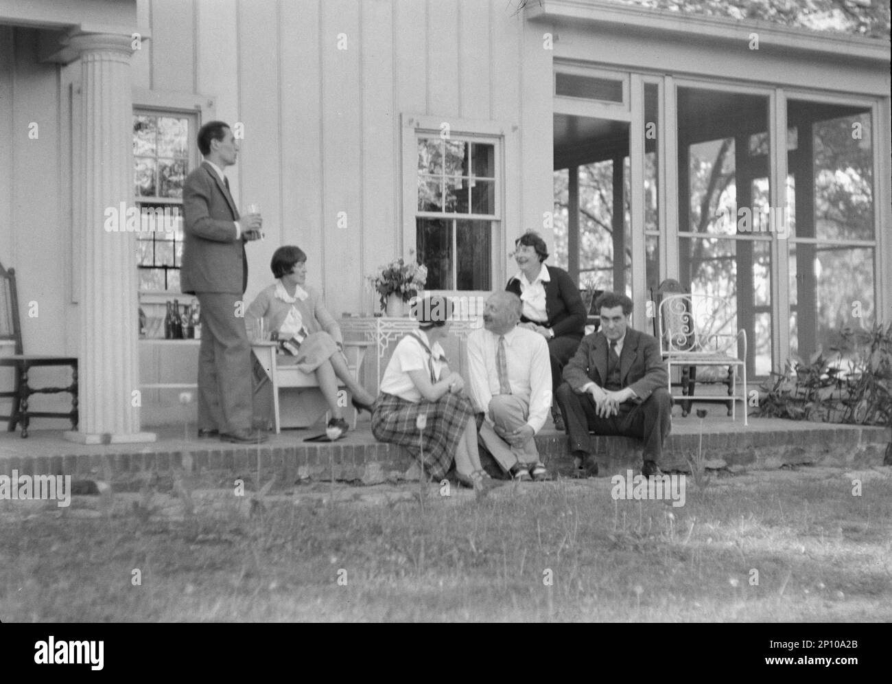 Collector seated Black and White Stock Photos & Images - Alamy