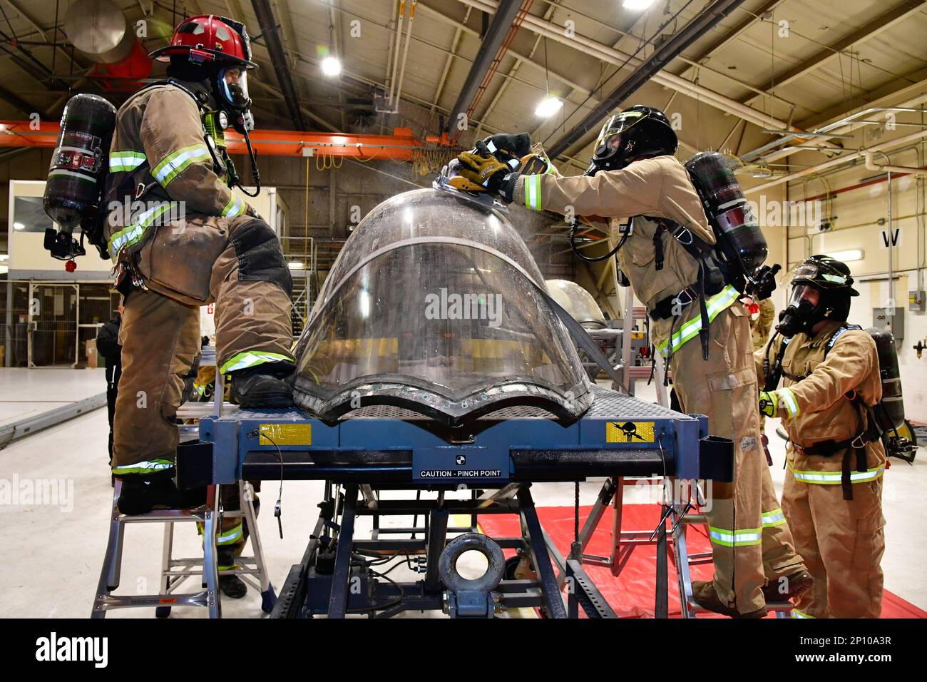 Visiting firefighters from Eglin Air Force Base, Florida, practice ...