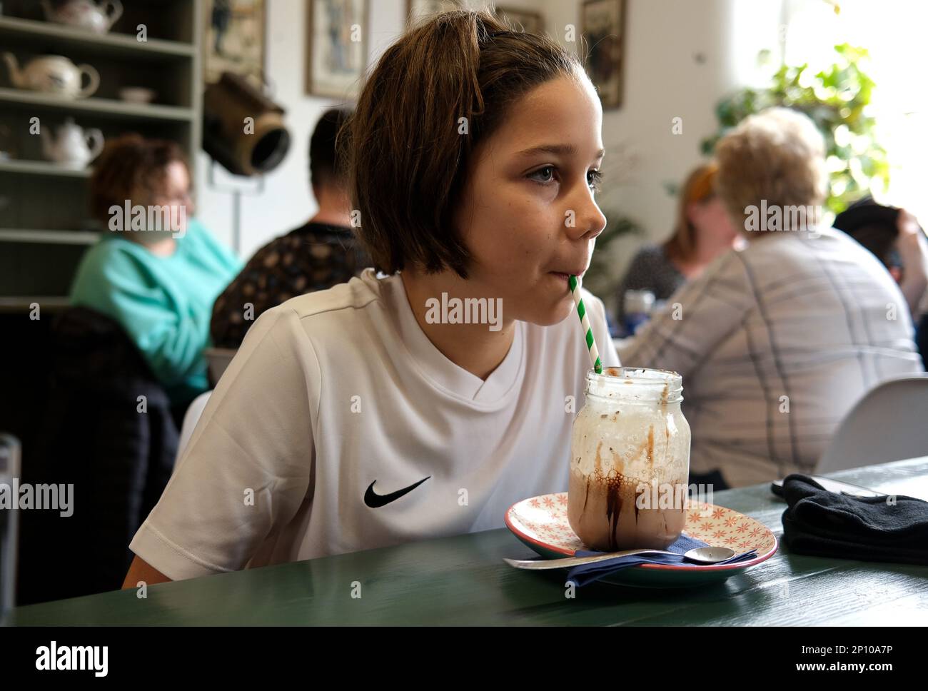 Child drinking chocolate milk shake. Children healthy drinking drinks ...