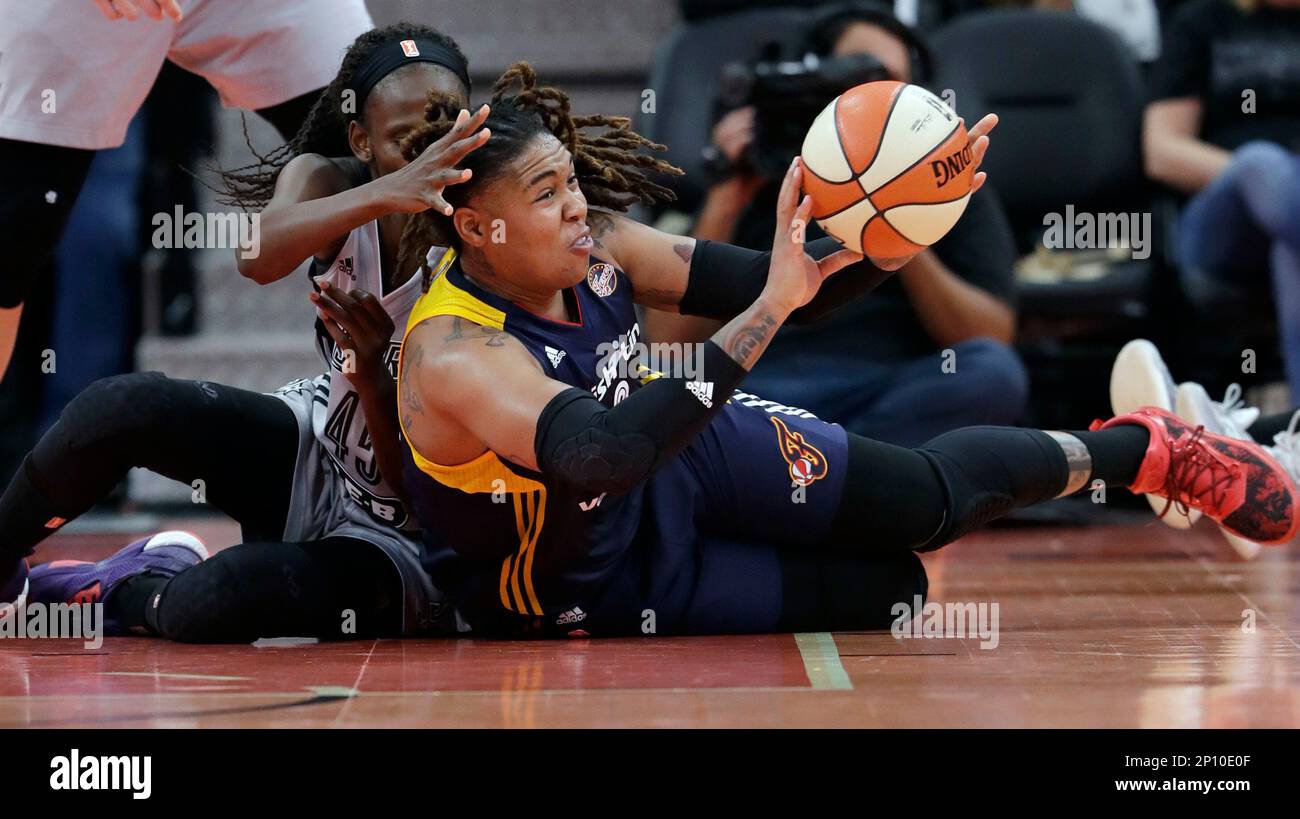 Indiana Fever forward Erlana Larkins, right, passes the ball off after ...