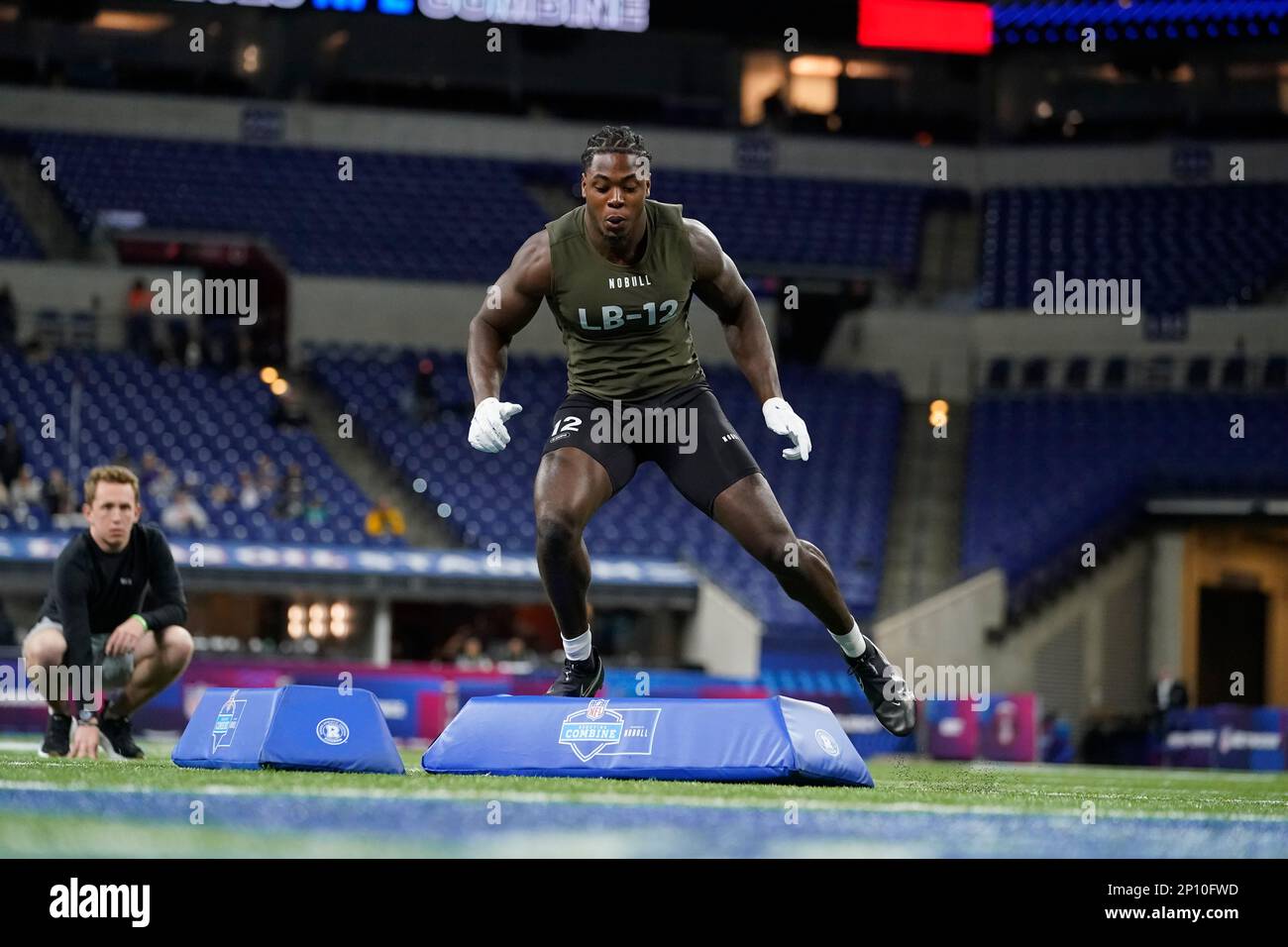 Duke linebacker Shaka Heyward runs a drill at the NFL football scouting ...