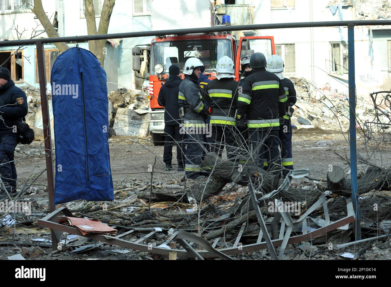 ZAPORIZHZHIA, UKRAINE - MARCH 3, 2023 - Rescuers are pictured outside ...