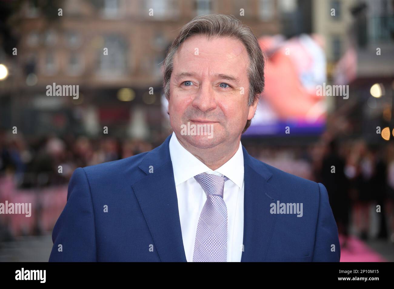 Actor Neil Pearson poses for photographers upon arrival at the World ...