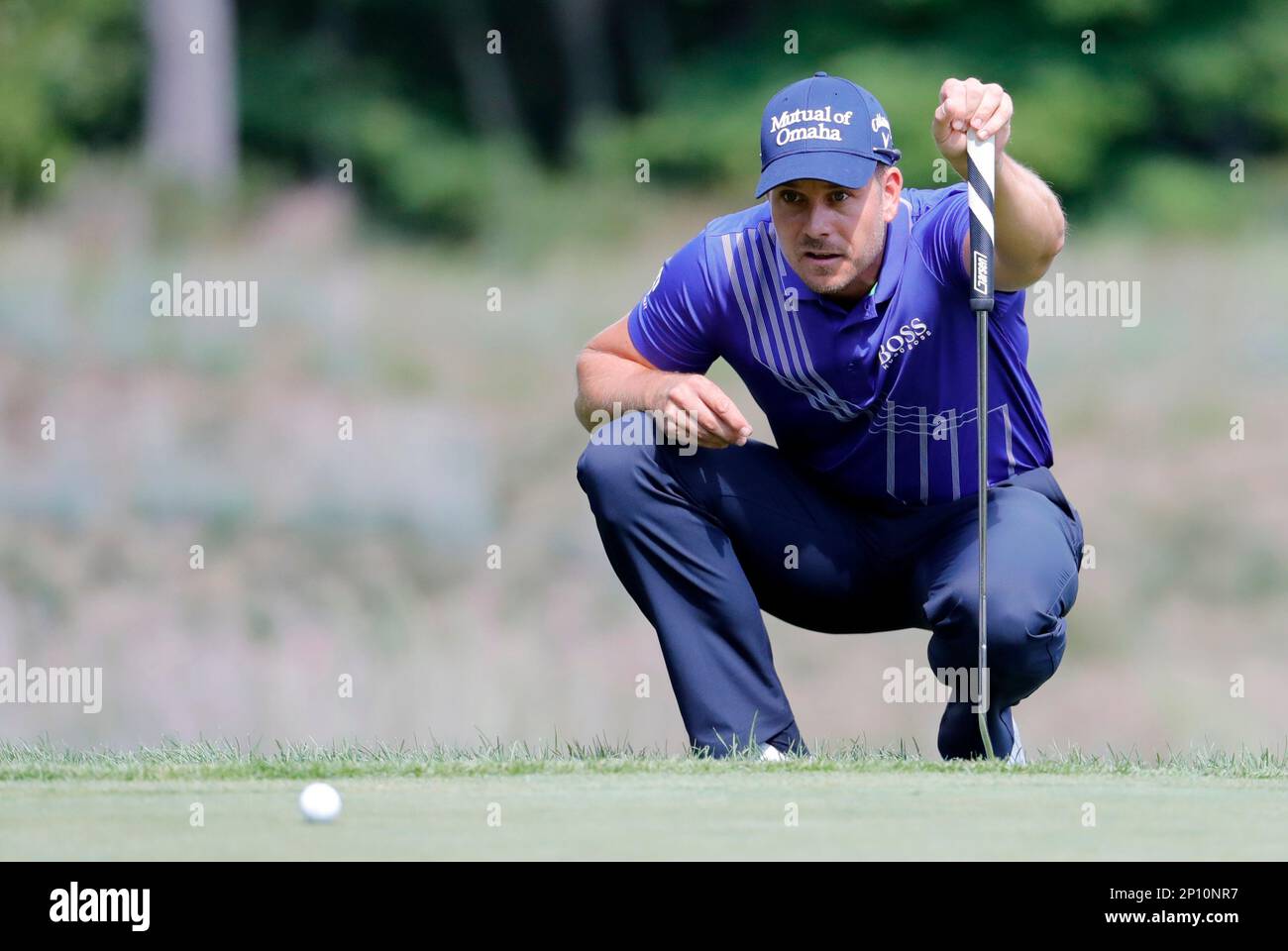 04 September 2016: Henrik Stenson reads his putt on 4 during the third ...