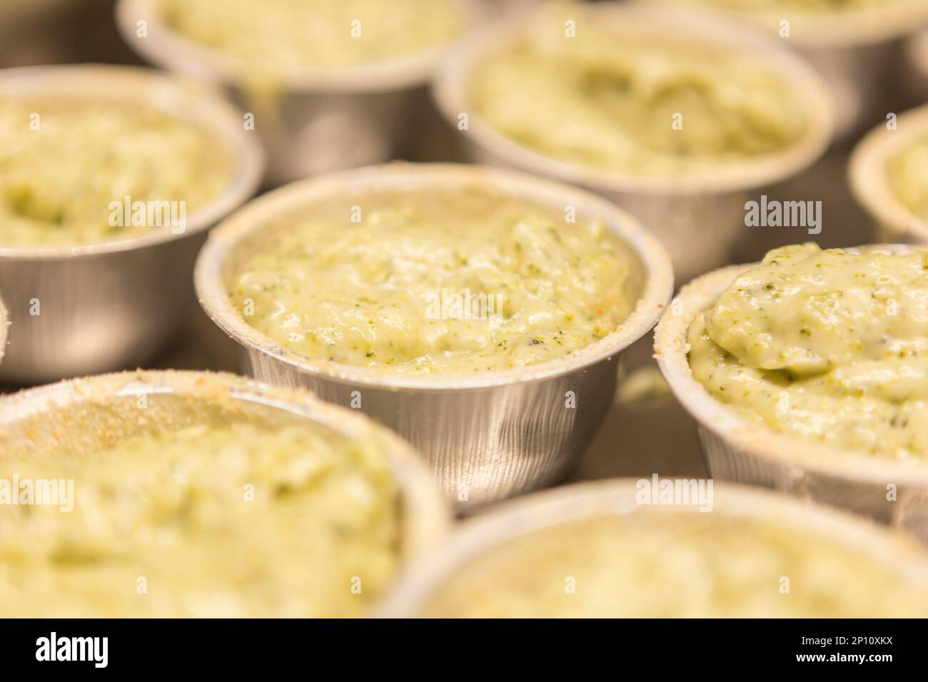 Close up detail of the making of a souffle recipe inside an industrial ...