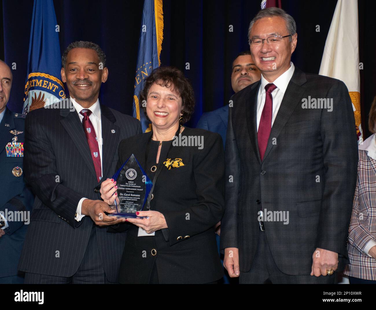 Dr. Carol Romano, of the Uniformed Services University, is presented ...