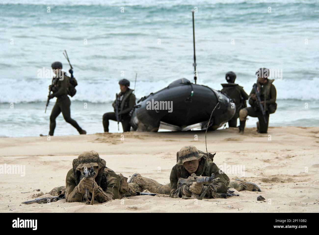 Tokunoshima, Japan. 03rd Mar, 2023. Members of Japan Ground Self-Defense Force's Amphibious ...