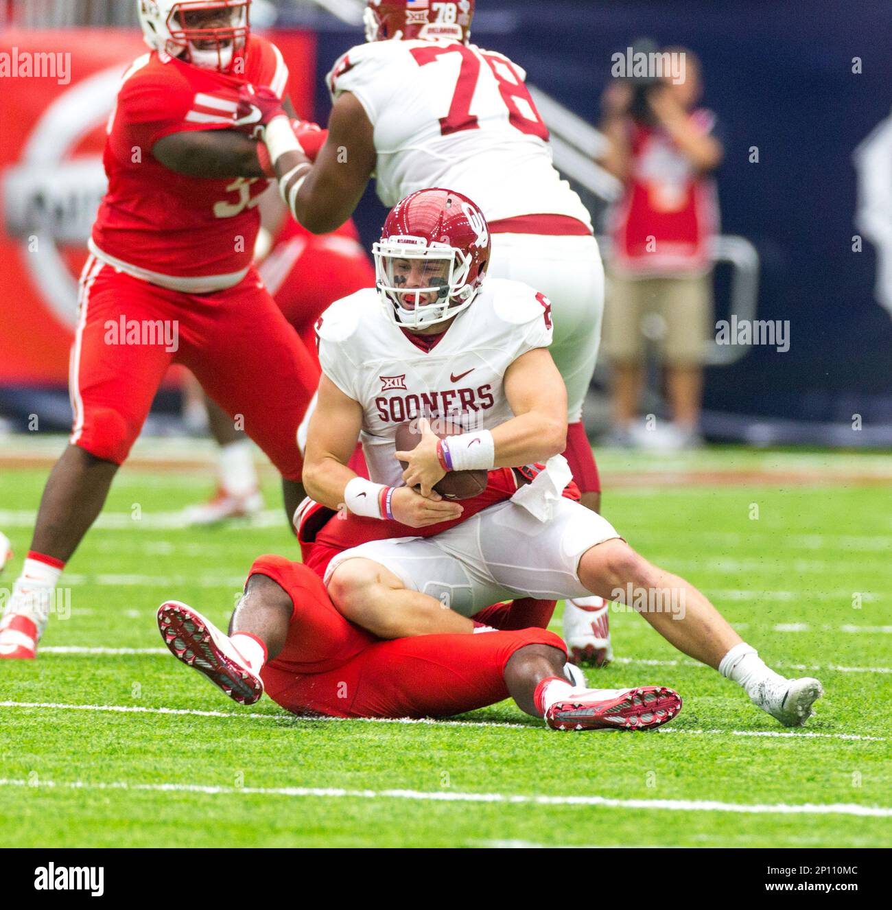 Oklahoma Sooners quarterback Baker Mayfield (6) is sacked by Houston Cougars linebacker Steven ...