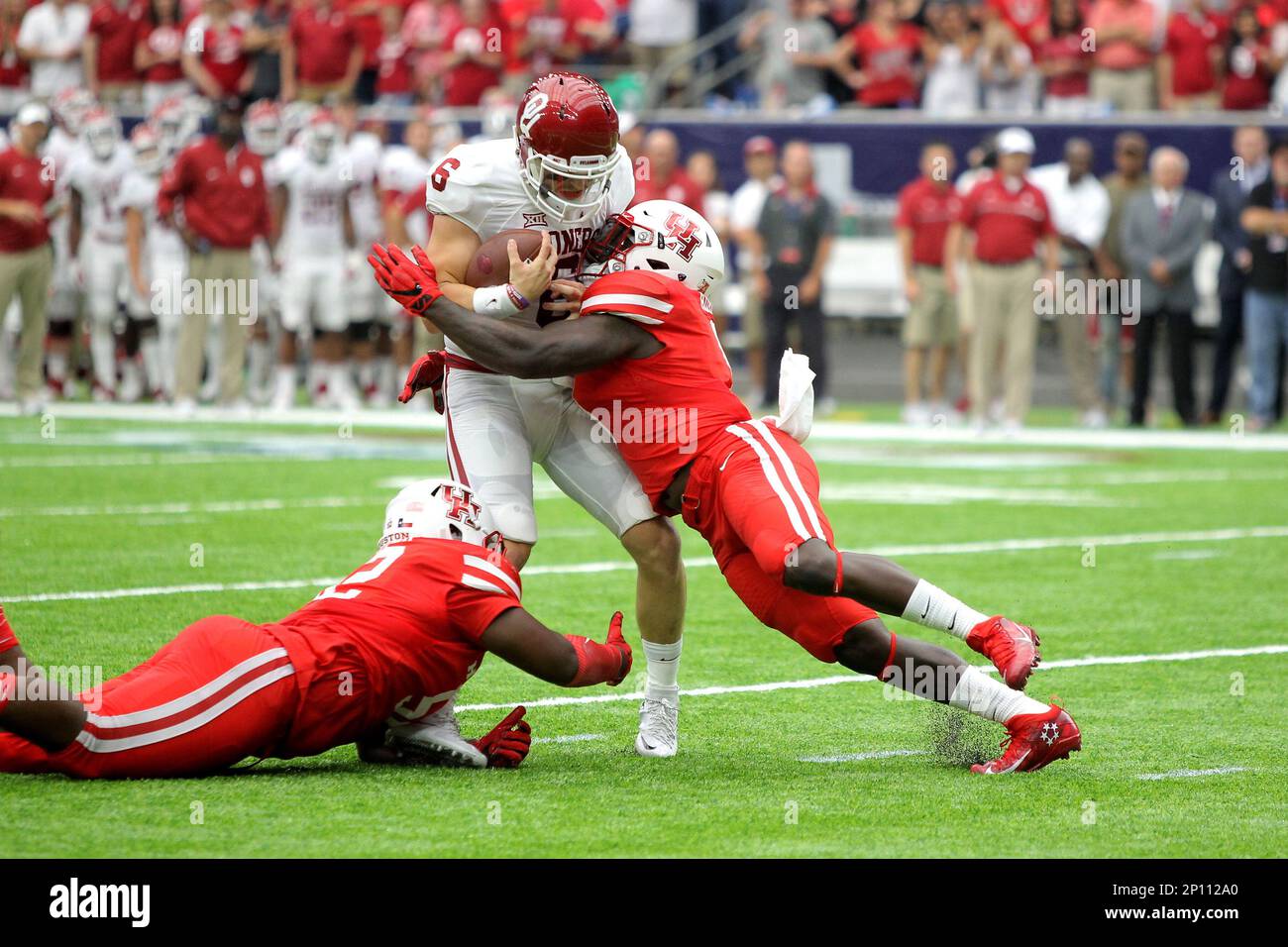 SEP 03 2016: Oklahoma Sooners quarterback Baker Mayfield (6) is tackled ...