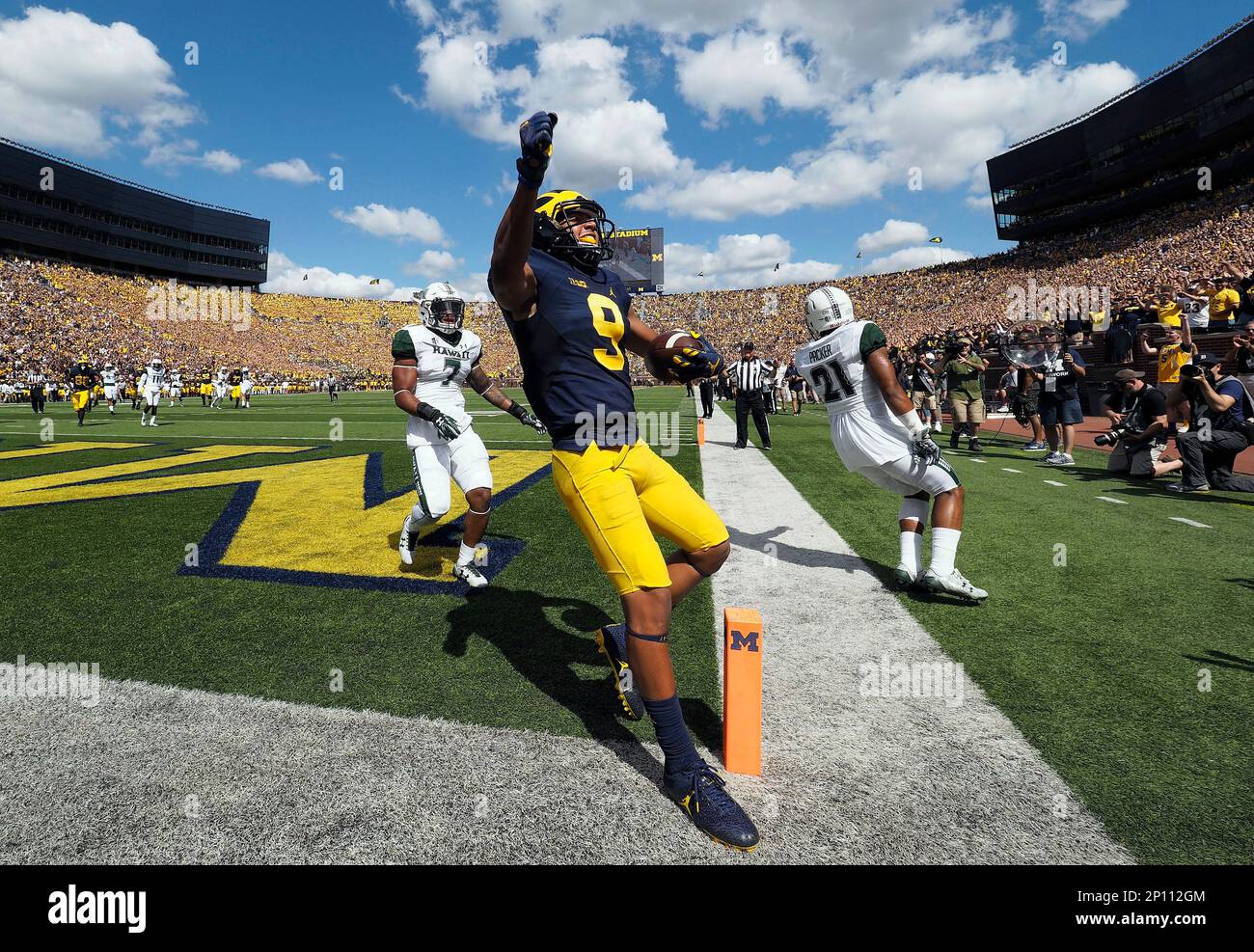Michigan wide receiver Grant Perry (9) celebrates scoring a touchdown ...