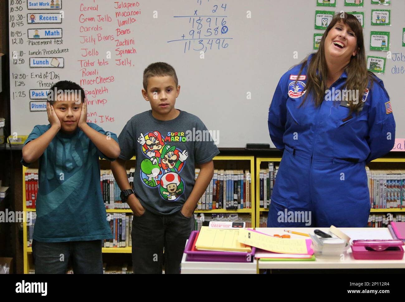 From left, Mauricio Huerta, Logan Gurr and Tami Pandoff play a memory ...