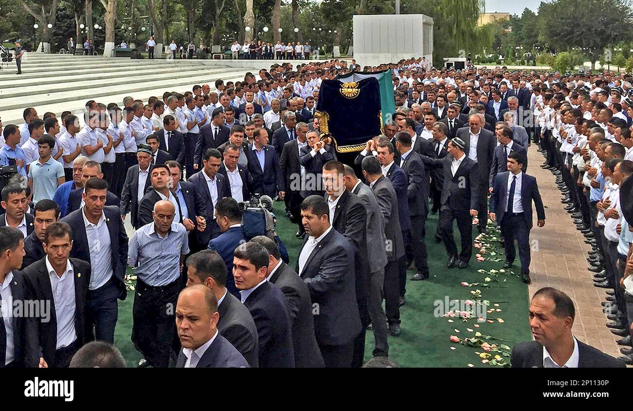 People line up as a coffin with the body of Uzbek President Islam ...