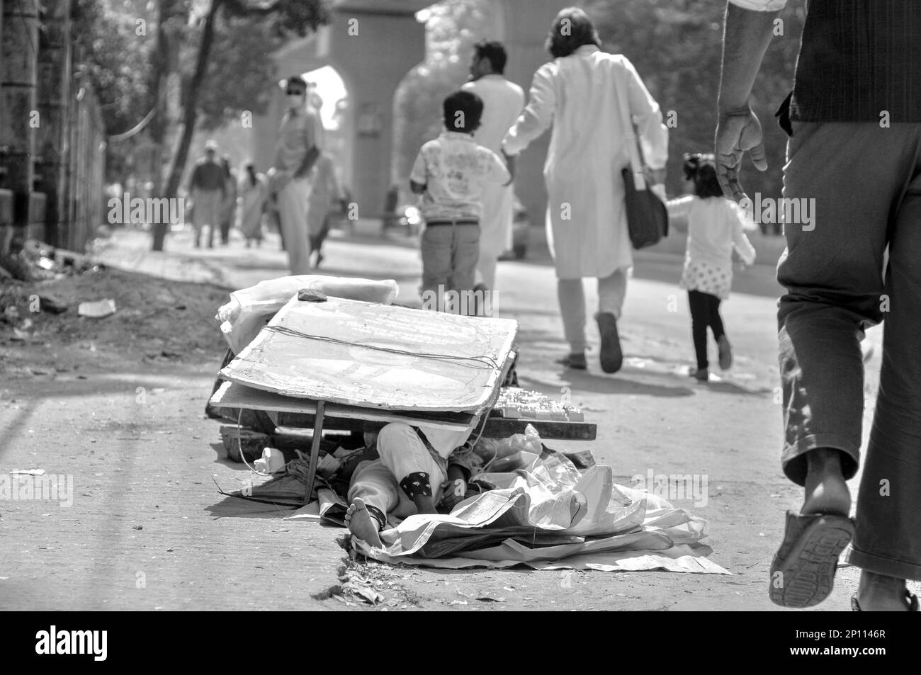 Homeless people sleep under hi-res stock photography and images - Alamy