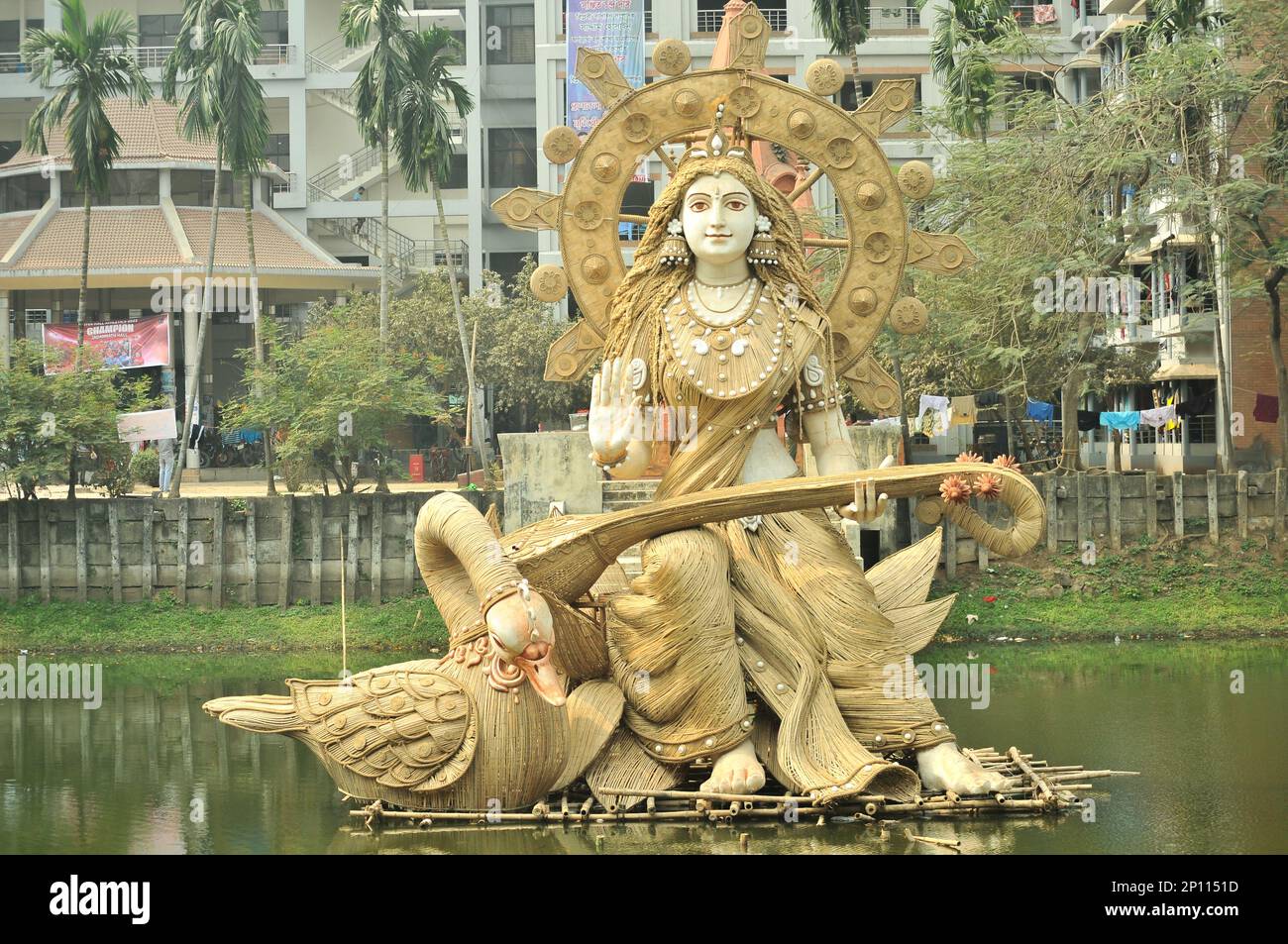 Big sculpture of hindu devi saraswati in a lake in Dhaka University ...