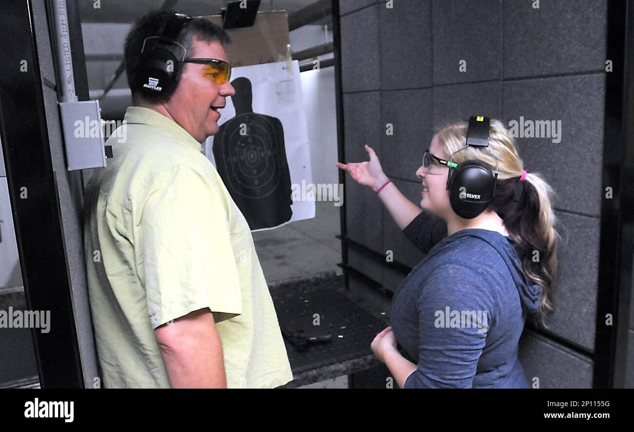 In this Saturday, Aug. 27, 2016 photo, conceal and carry instructor ...