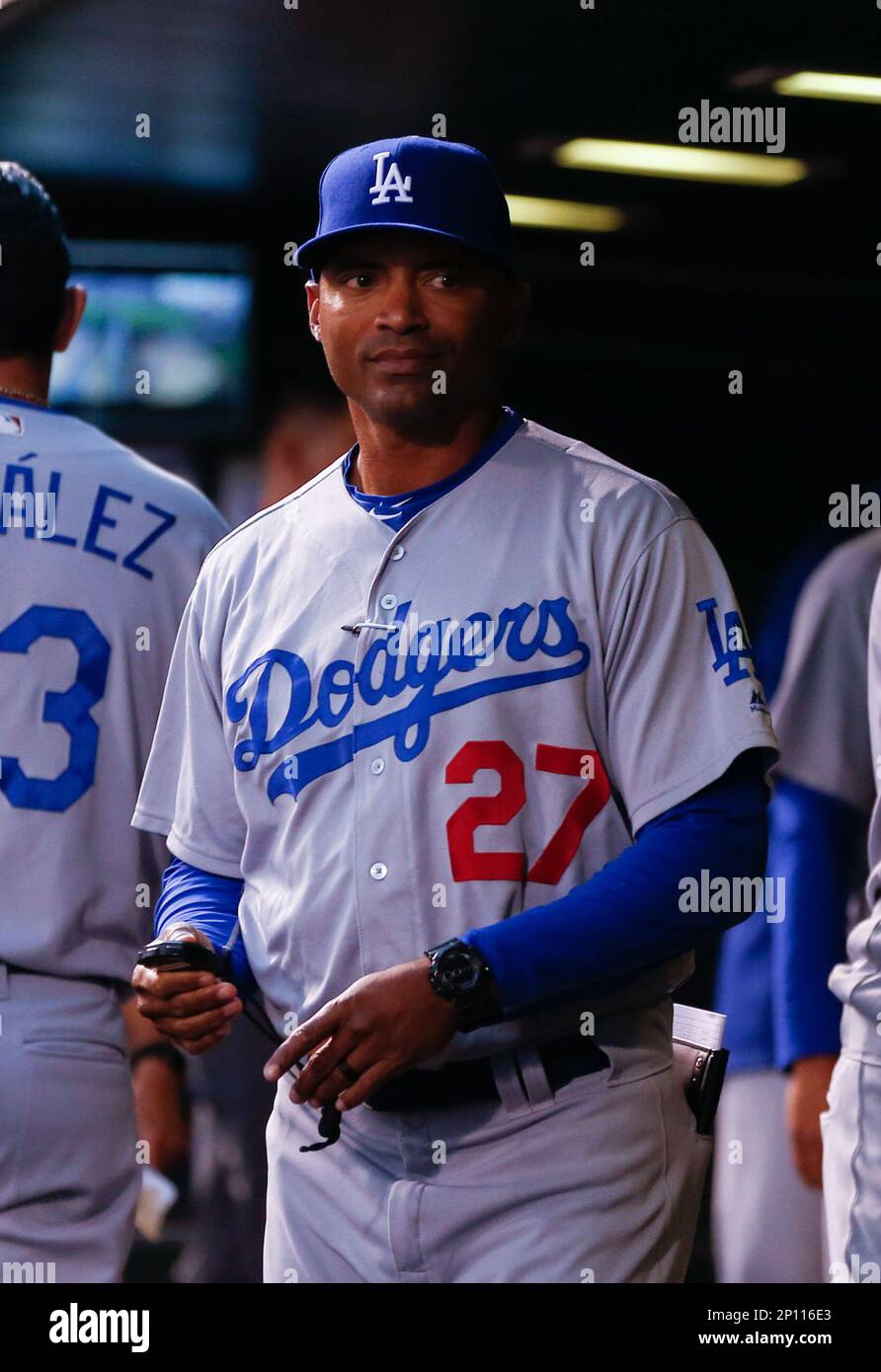 Los Angeles Dodgers first base coach George Lombard (27) prepares for ...