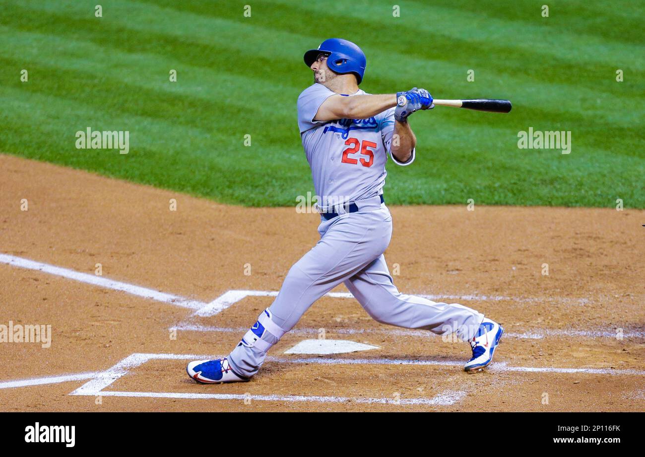 Los Angeles Dodgers third baseman Rob Segedin (25) swings at the pitch ...