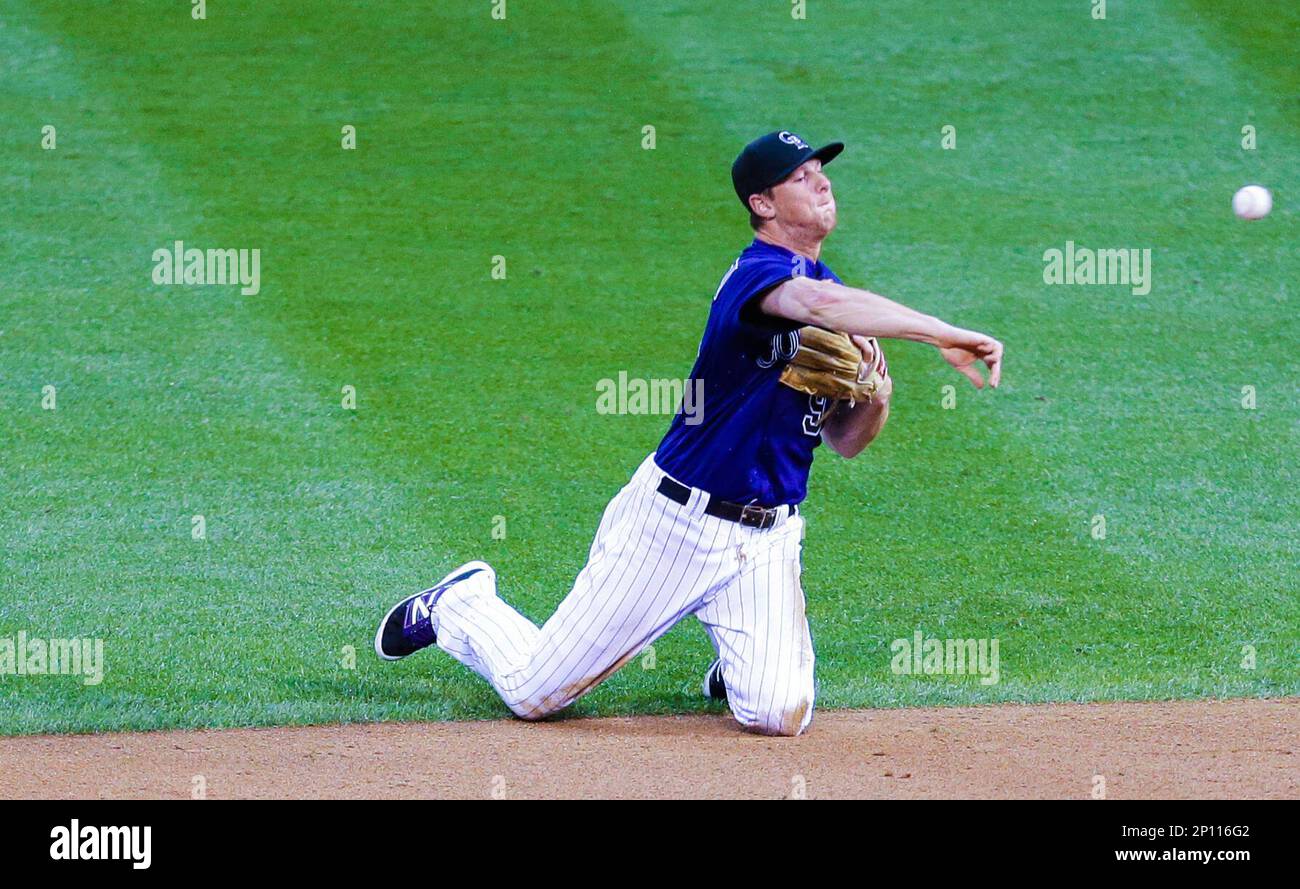 Colorado Rockies second baseman DJ LeMahieu (9) makes the throw to ...