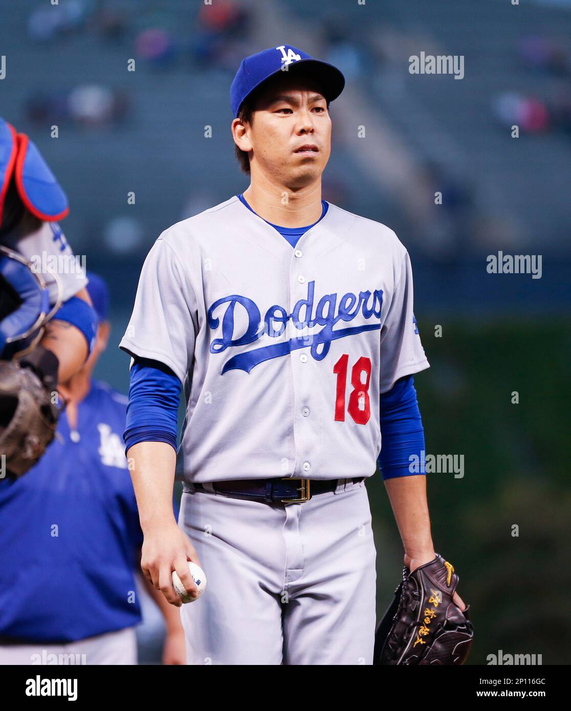 Los Angeles Dodgers starting pitcher Kenta Maeda (18) prepares for the ...