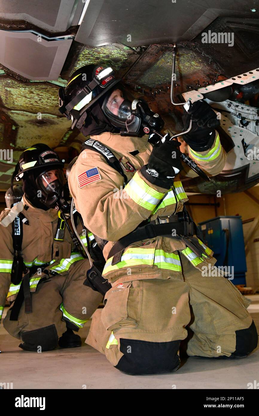 (Left to right) Senior Airman Dustin Fahlbusch, fire protection ...