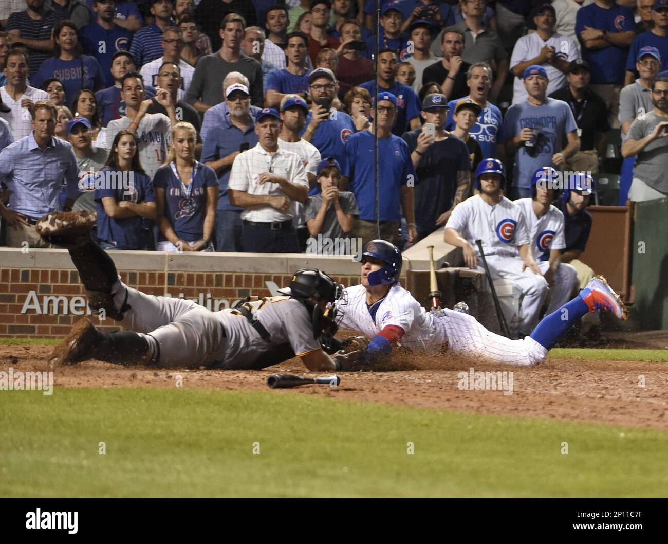 Pittsburgh Pirates catcher Francisco Cervelli, left, tags out Chicago ...