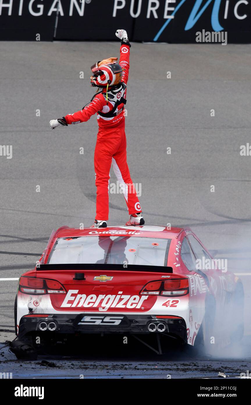 Kyle Larson (42) celebrates his win with a burnout during the NASCAR ...