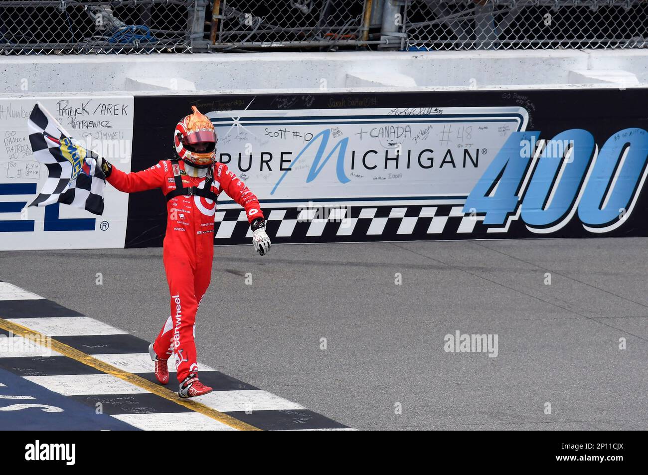 Kyle Larson (42) celebrates his win with a burnout during the NASCAR ...