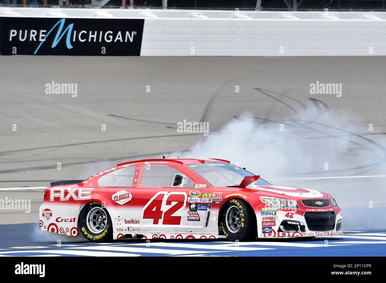 Kyle Larson (42) celebrates his win with a burnout during the NASCAR ...