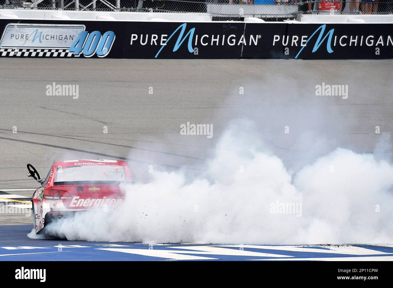 Kyle Larson (42) celebrates his win with a burnout during the NASCAR ...