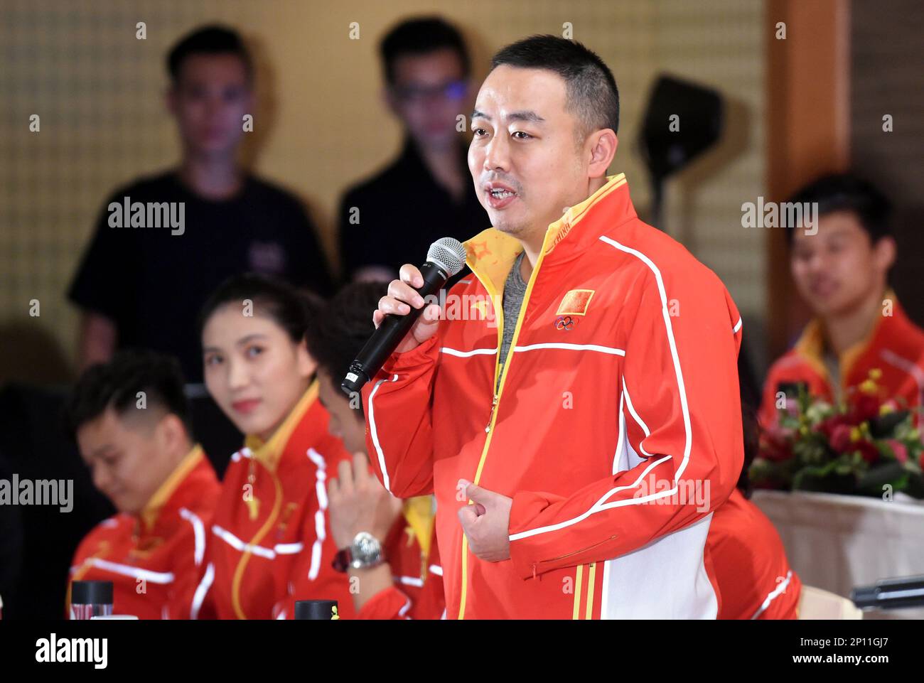 Liu Guoliang, coach of China's national table tennis team, attends a ...