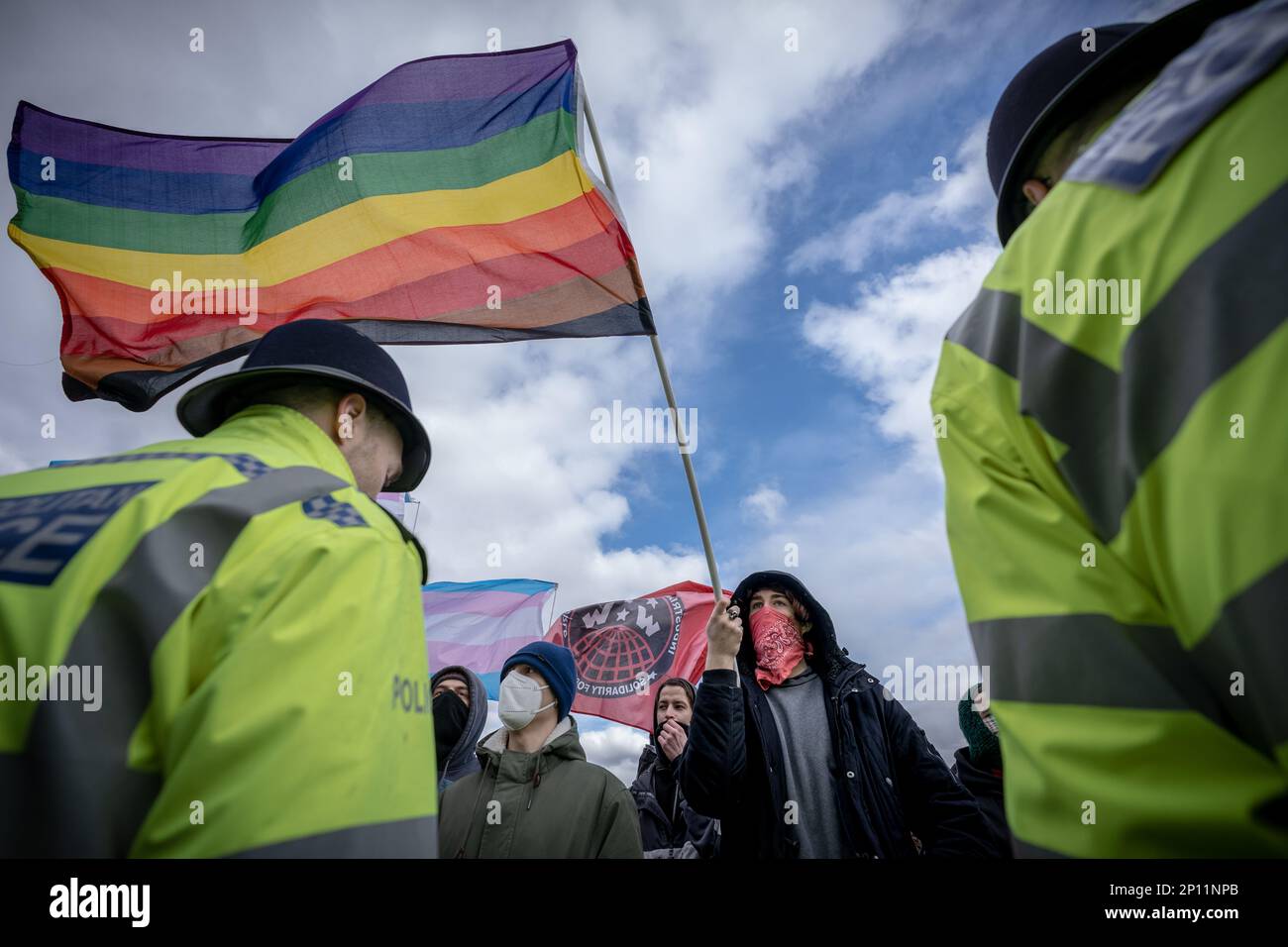 Transgender rights activists counter-protest and clash with Standing ...