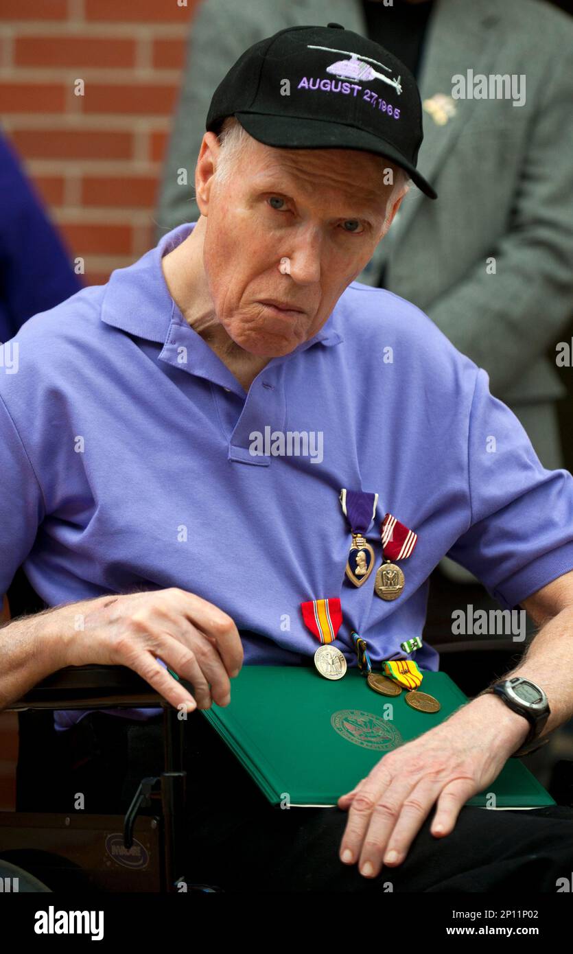Pfc. Ronald Esselstyn poses for a photo after he was awarded the Purple ...