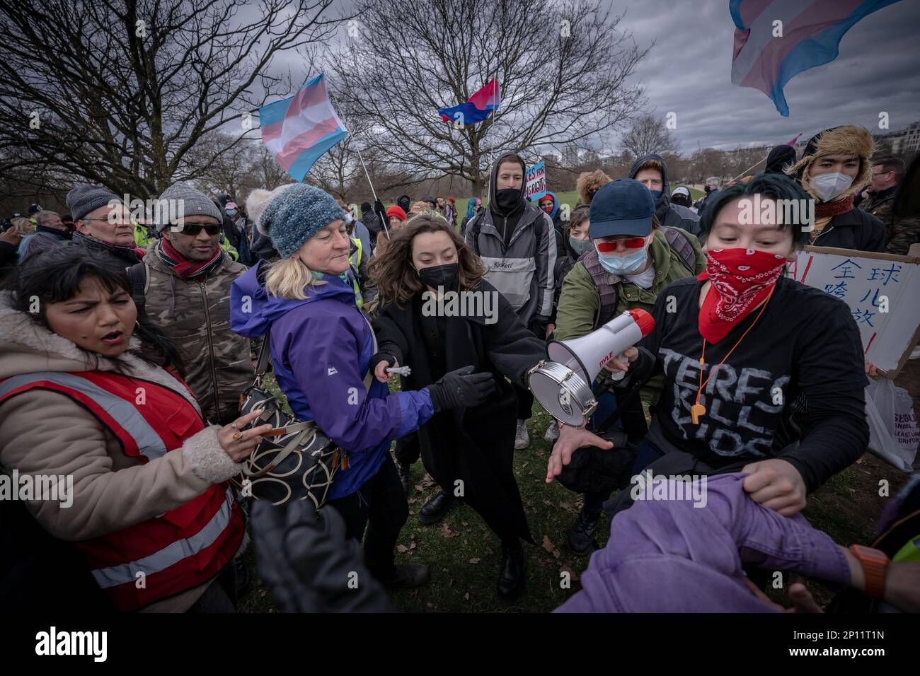 Transgender rights activists counter-protest and clash with Standing ...