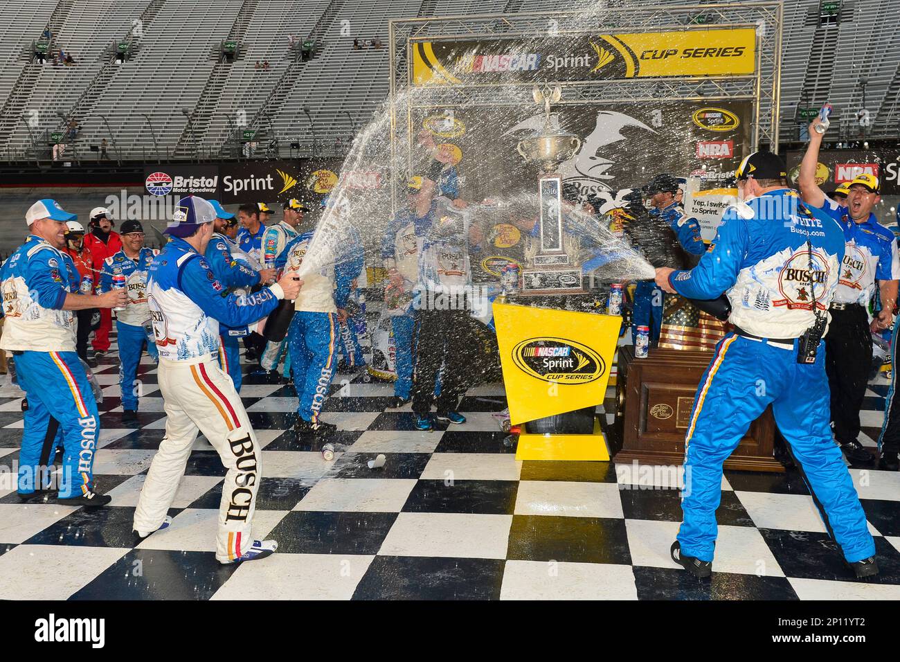 Kevin Harvick (4) celebrates with champagne in victory lane after ...
