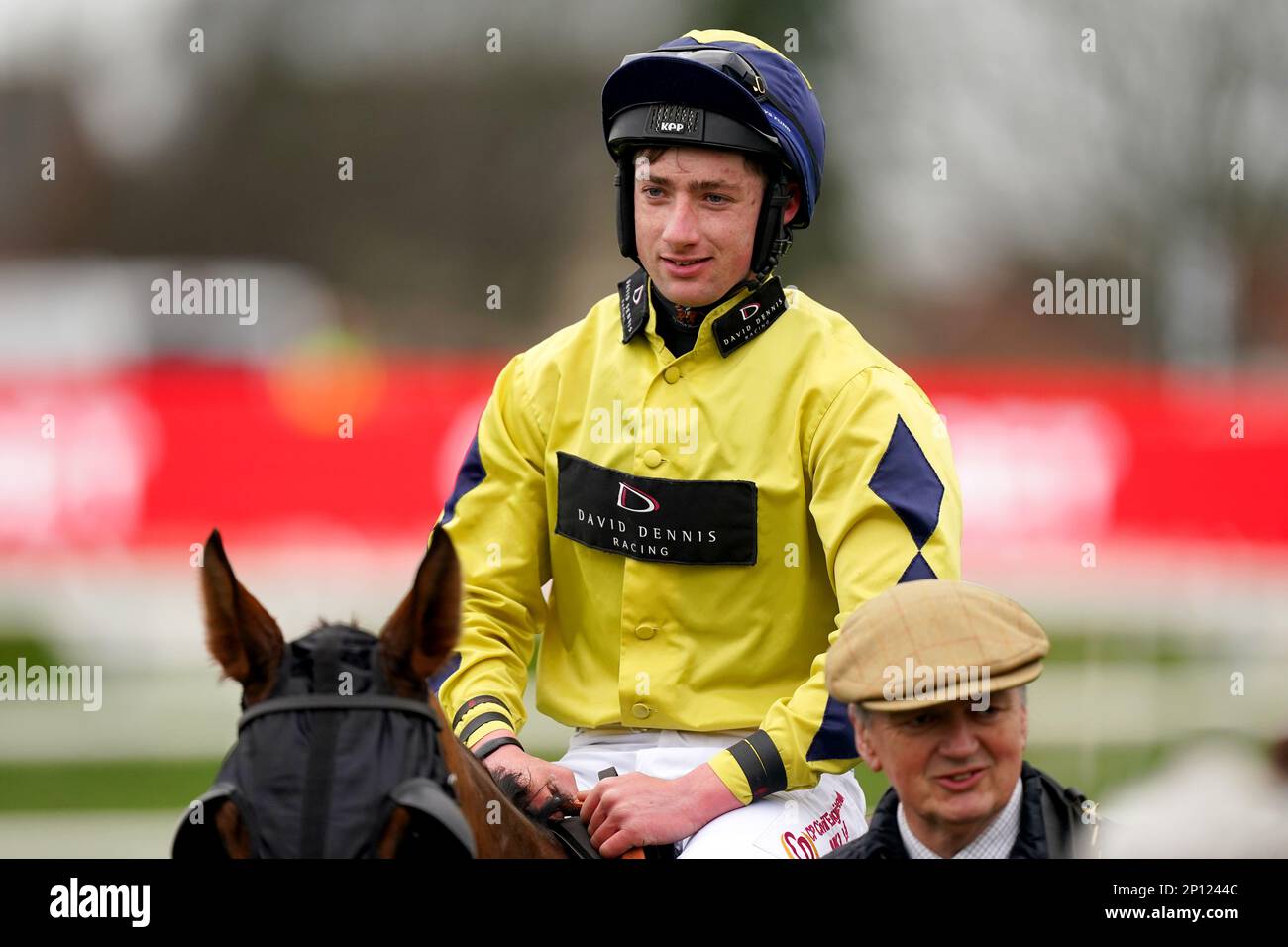 Jockey Ned Fox makes their way back after winning the Virgin Bet ...