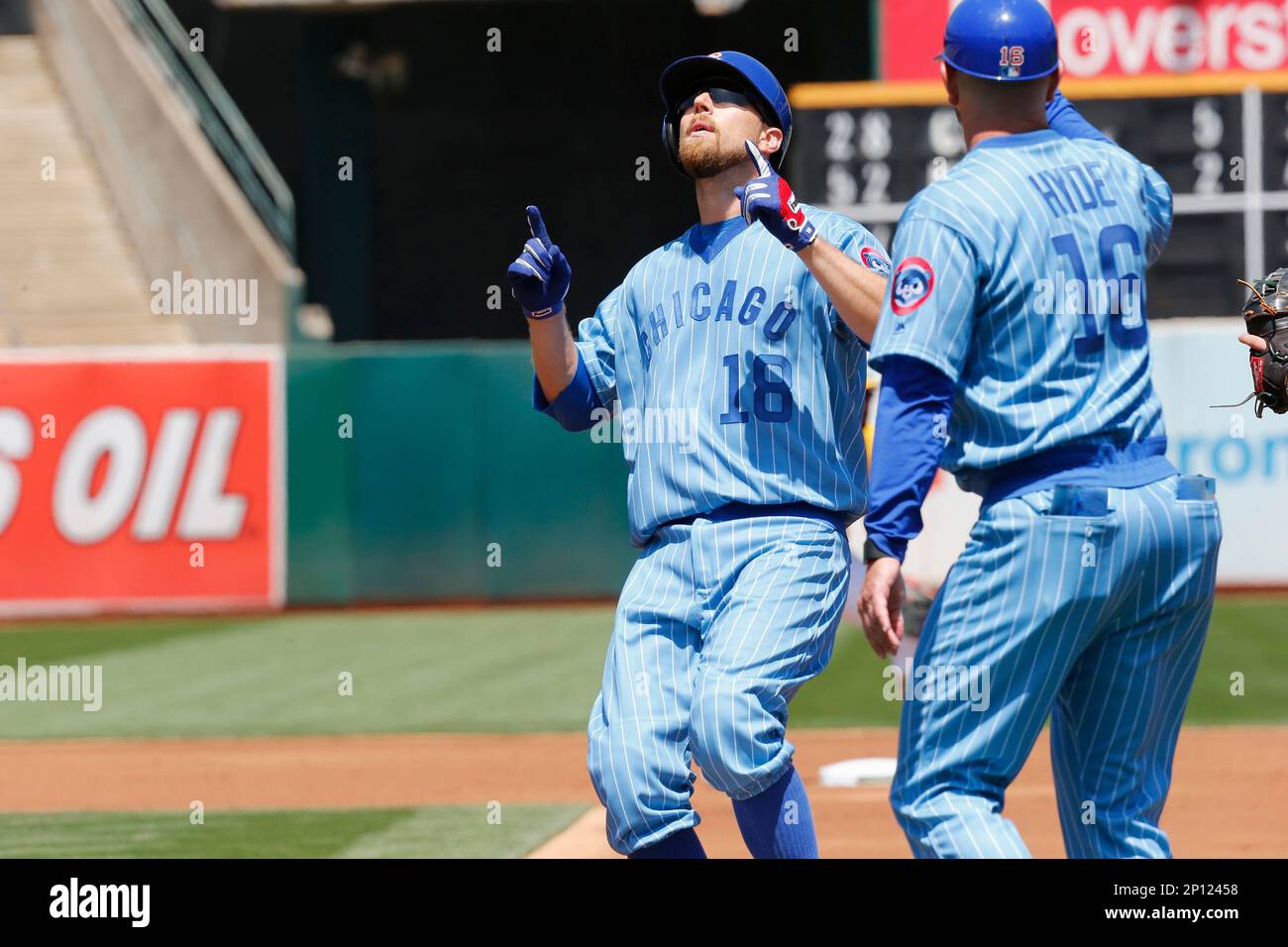 Chicago Cubs second baseman Ben Zobrist (18) and Chicago Cubs first ...