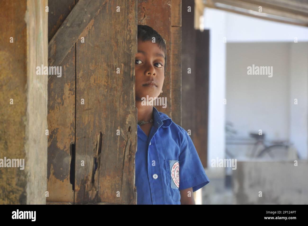 Picture of some under privileged poor innocent school boy Stock Photo ...