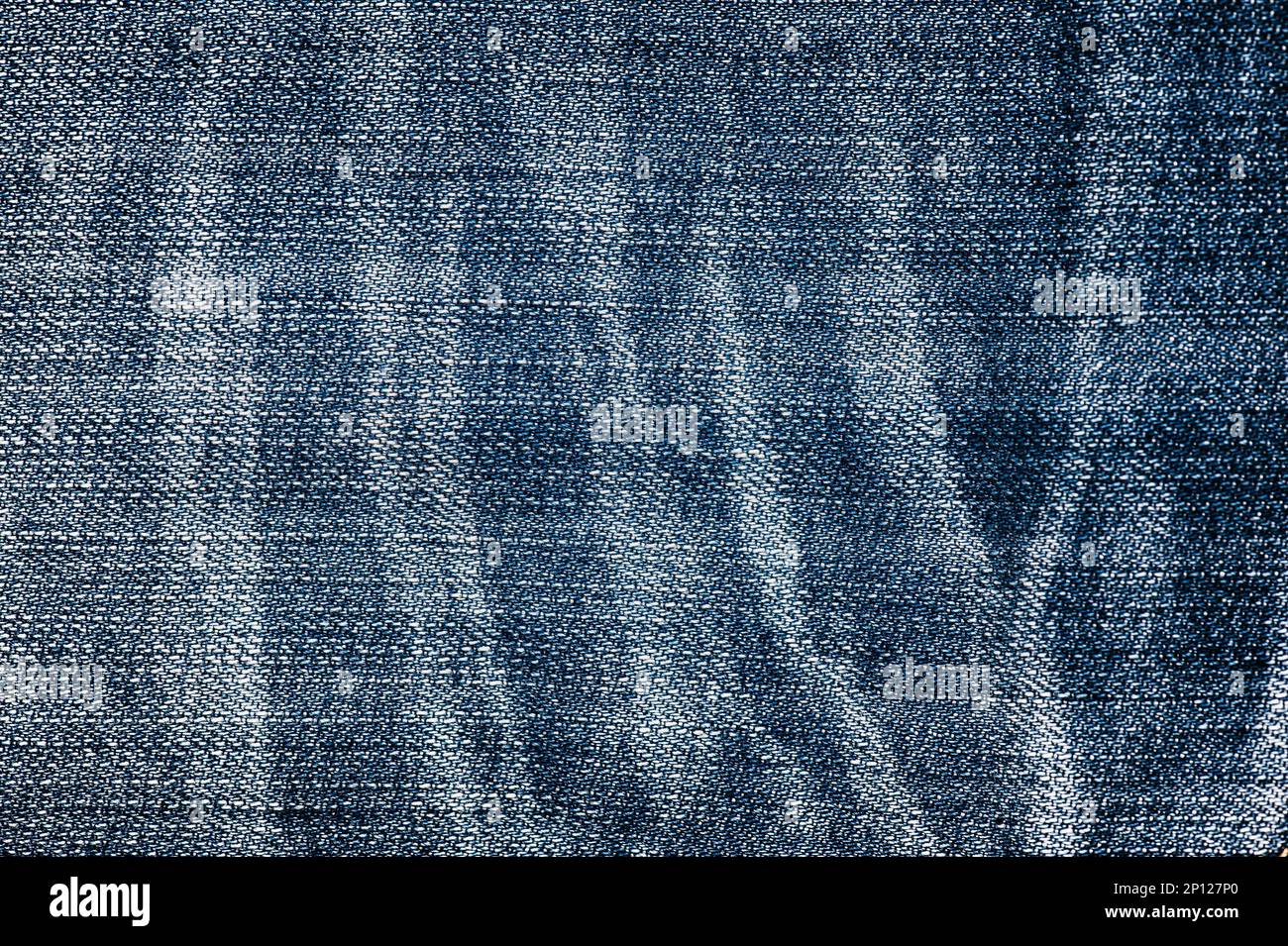 Jeans tissue background texture - wrinkled and discolored Stock Photo ...