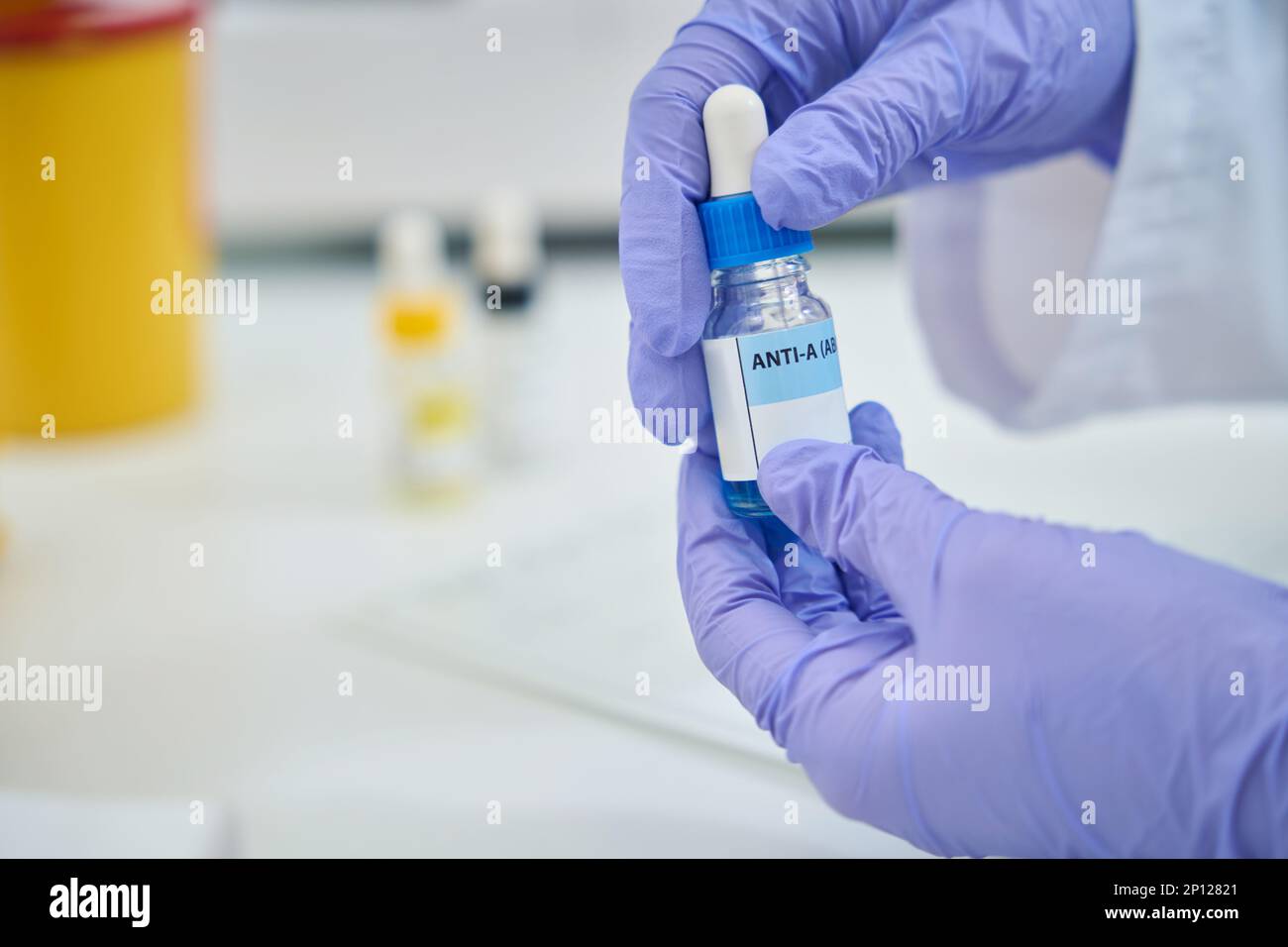Reagent for determining blood type in hands of laboratory employee ...