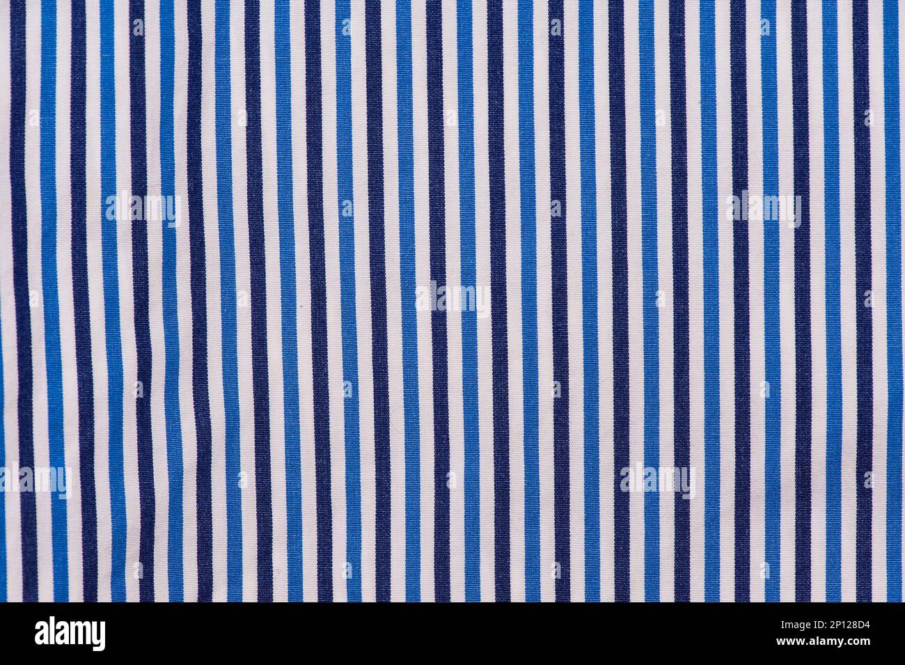 Fabric shirt with vertical stripes blue, light blue and white texture ...