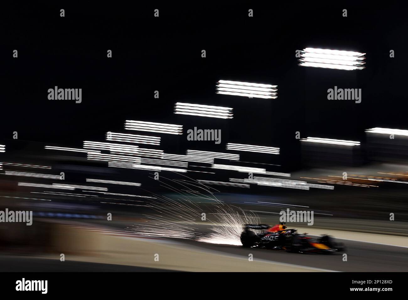Max Verstappen (NLD) Red Bull Racing RB19 sends sparks flying. Formula ...