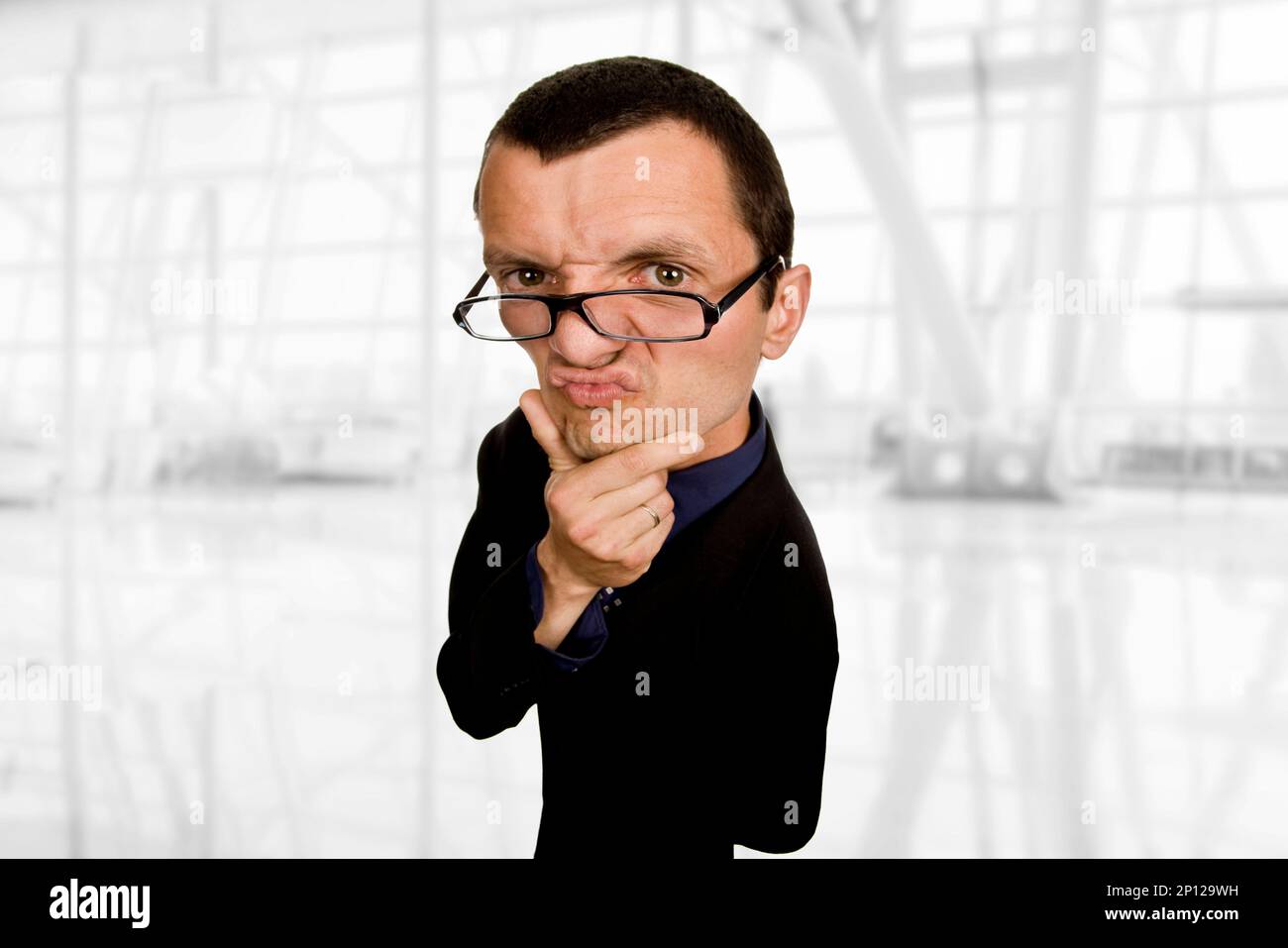 young distorted business man at the office Stock Photo - Alamy